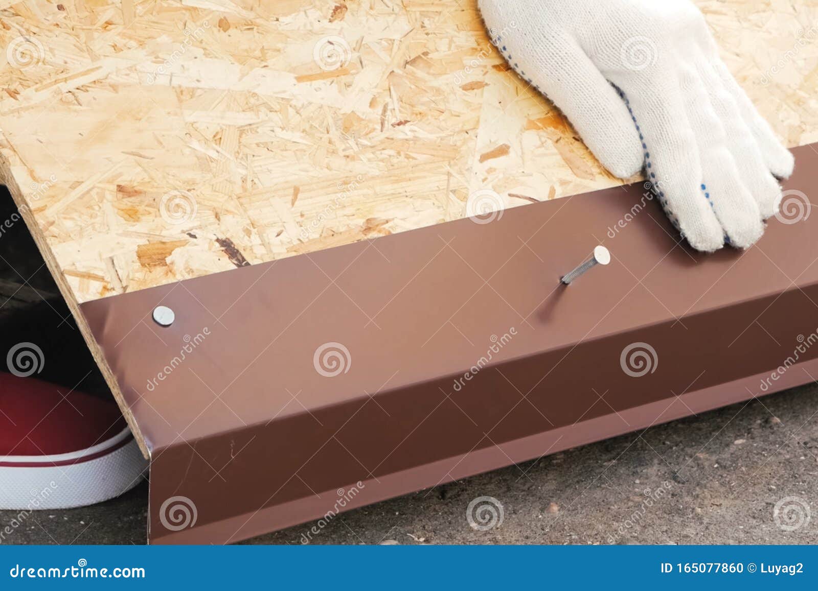 Nailing and Hammering Sheet of Roofing Iron Stock Photo - Image of nail ...