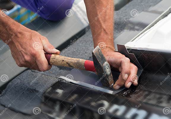 Nailing on metal sheet stock photo. Image of labor, steel - 17328762