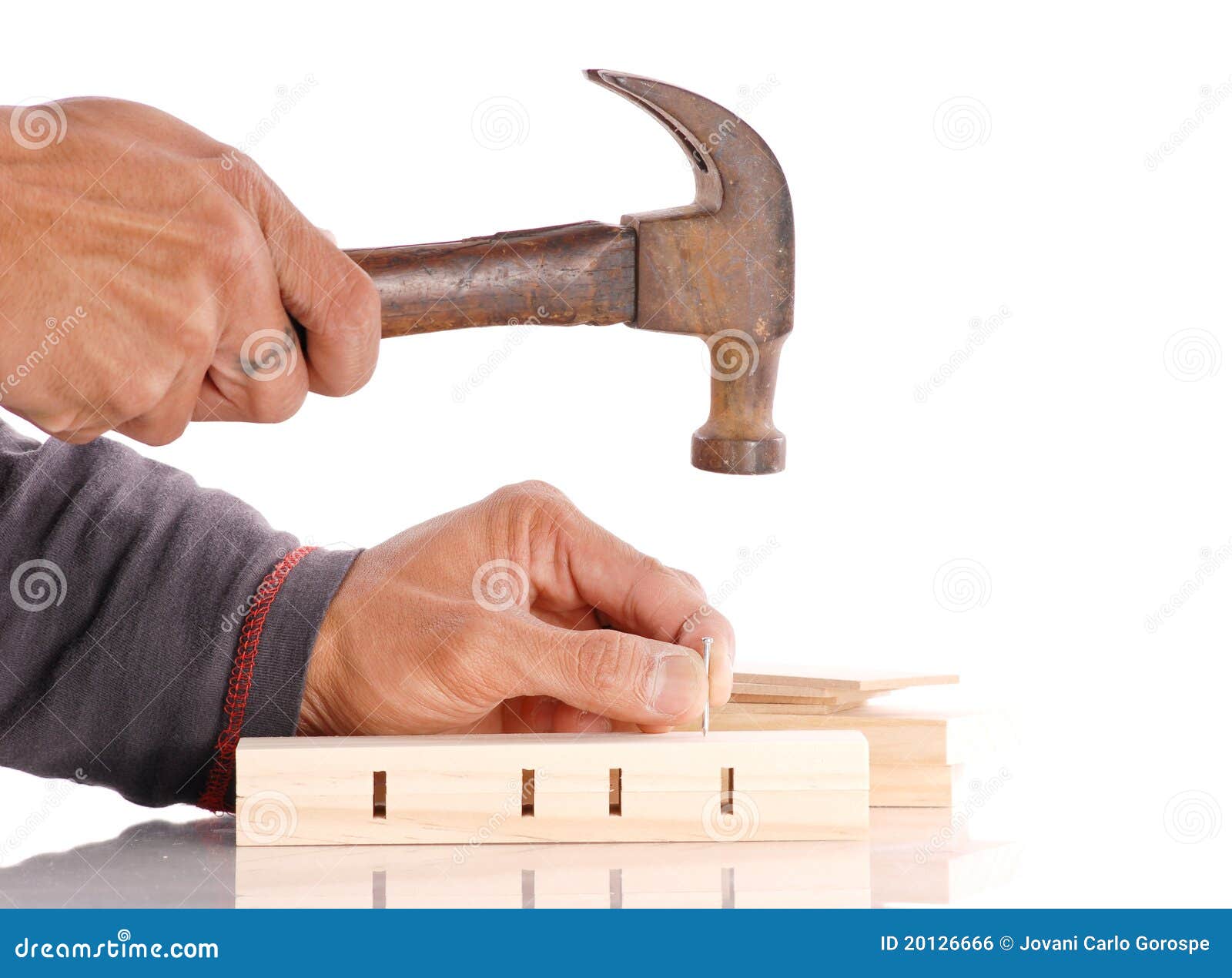 Nailing the Parts Together stock photo. Image of assembly - 20126666