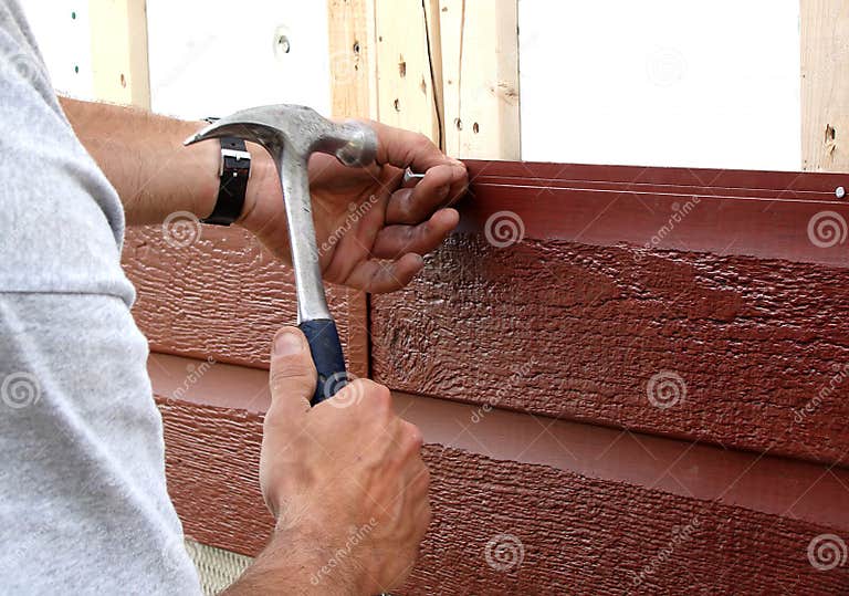 Nailing siding stock image. Image of reno, plank, nail - 14729911