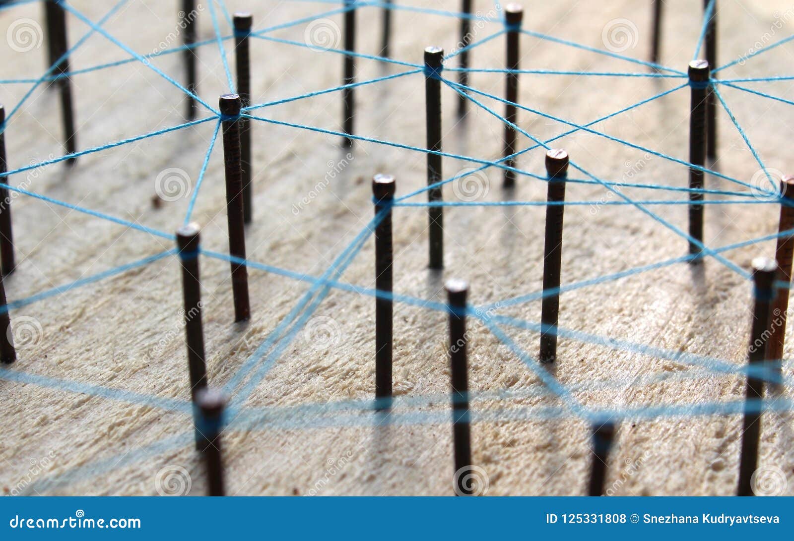 Nails Stuck in a Wooden Board and Stretched Like a Thread Stock Photo ...