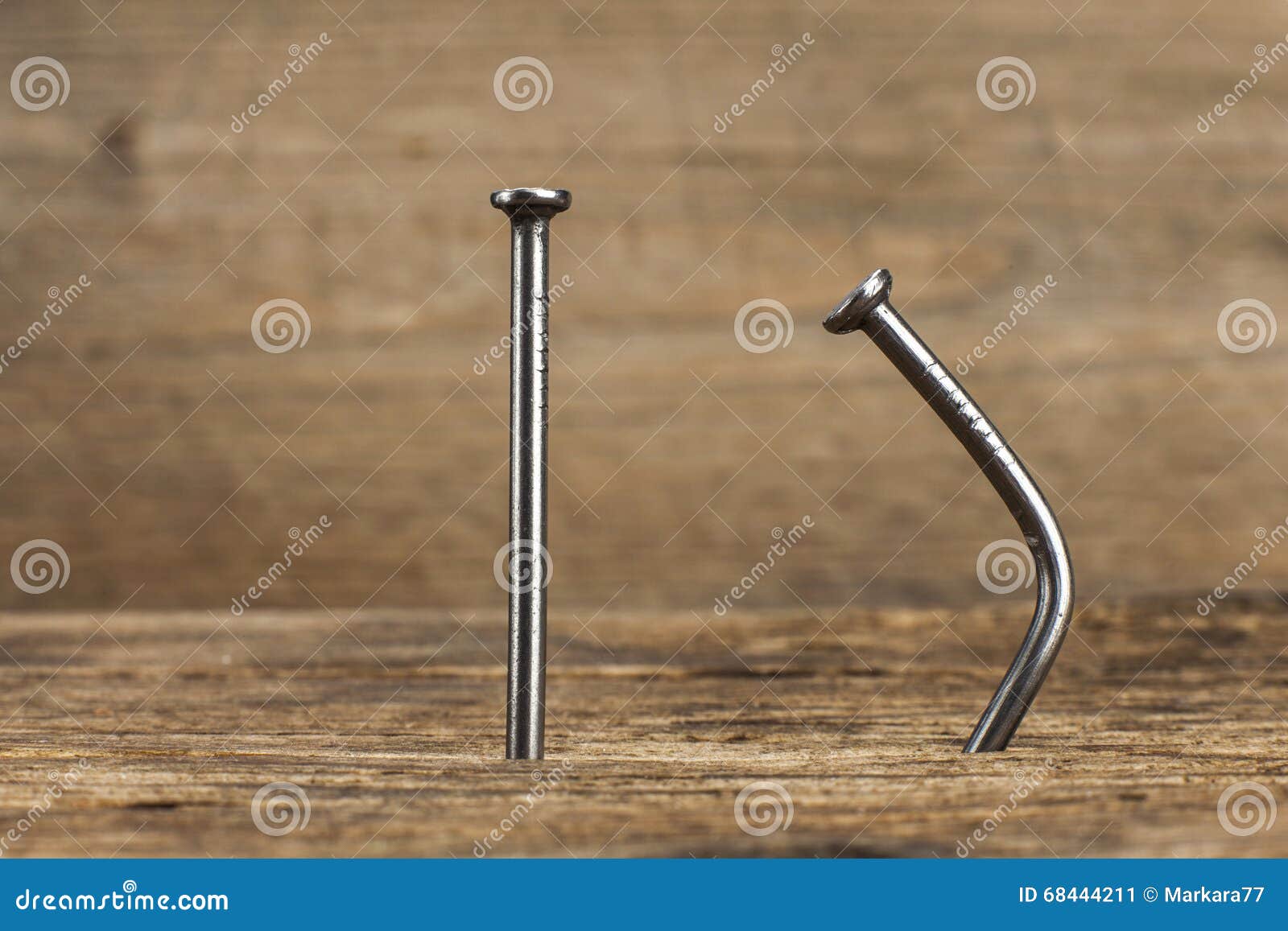 Nails into a wooden plank stock image. Image of work - 68444211