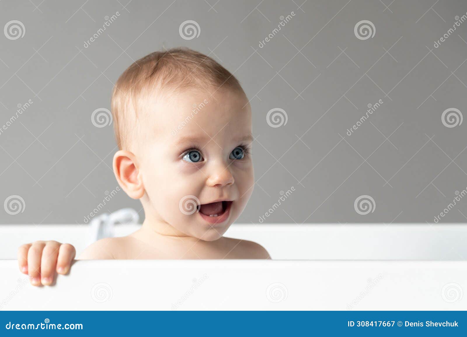 The Naive Look of a Baby with an Open Mouth As an Expression of the ...