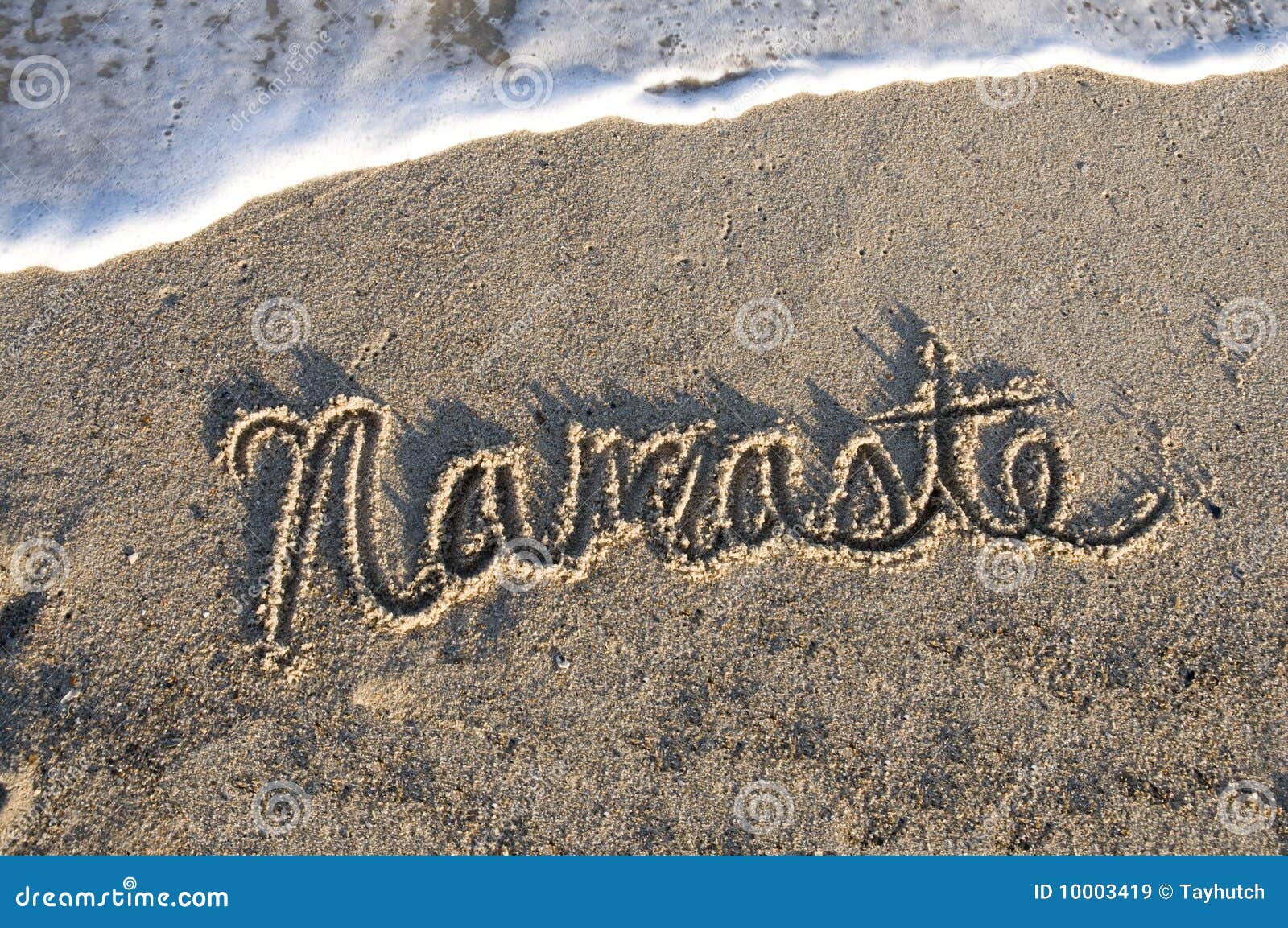 Namaste Written in the Sand Stock Image - Image of writing, beach: 10003419
