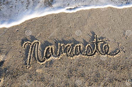 Namaste Written in the Sand Stock Image - Image of writing, beach: 10003419