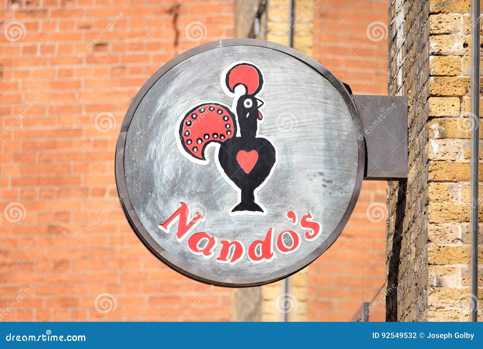 Nando`s Restaurant Sign editorial photography. Image of millennial ...