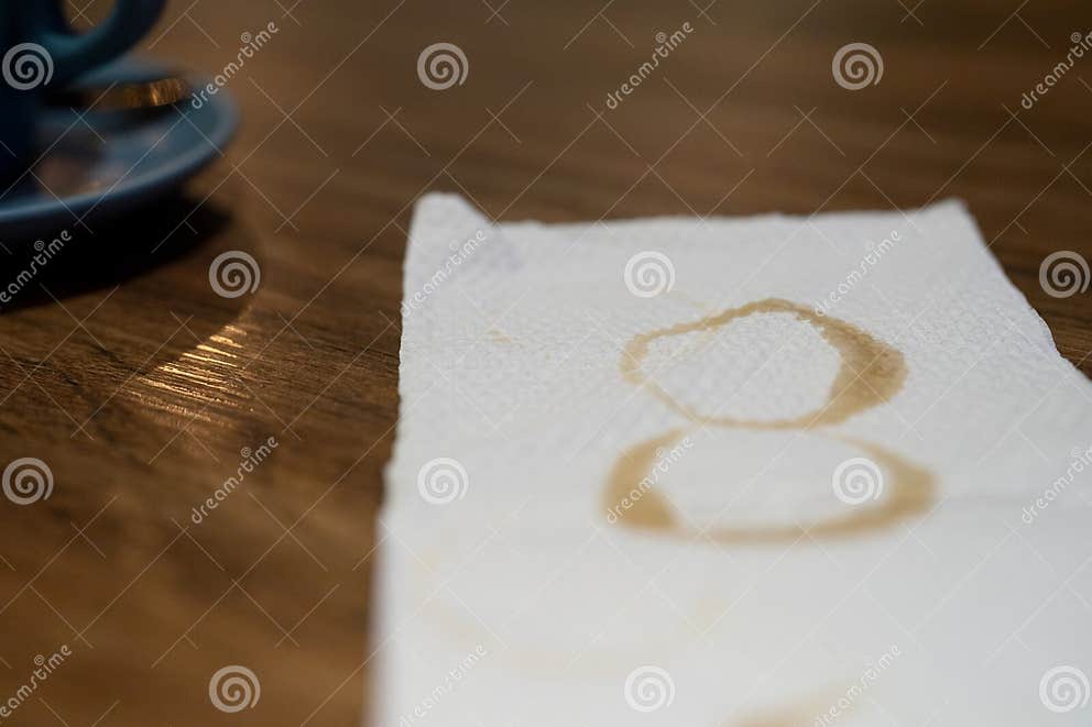 Napkin with coffee stain stock image. Image of table - 335275695