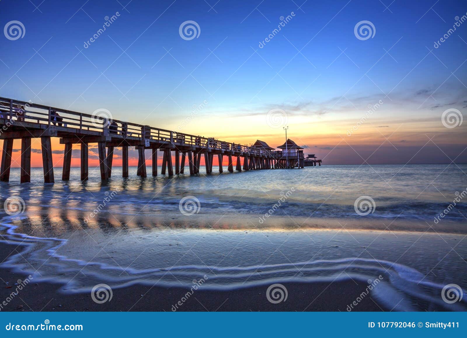 Naples Pier on the Beach at Sunset Stock Photo - Image of gulf, high ...