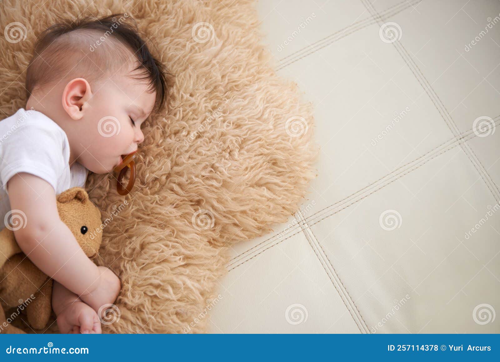 He always Naps after Feeding. an Adorable Baby Boy Taking a Nap. Stock ...