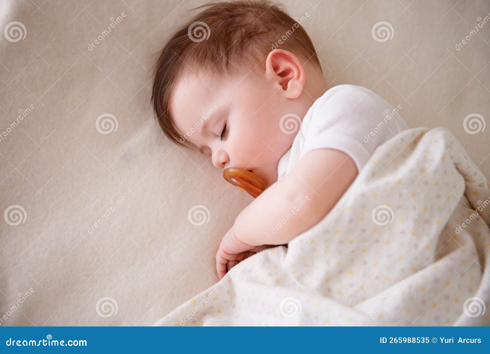 He always Naps after Feeding. an Adorable Baby Boy Taking a Nap. Stock ...