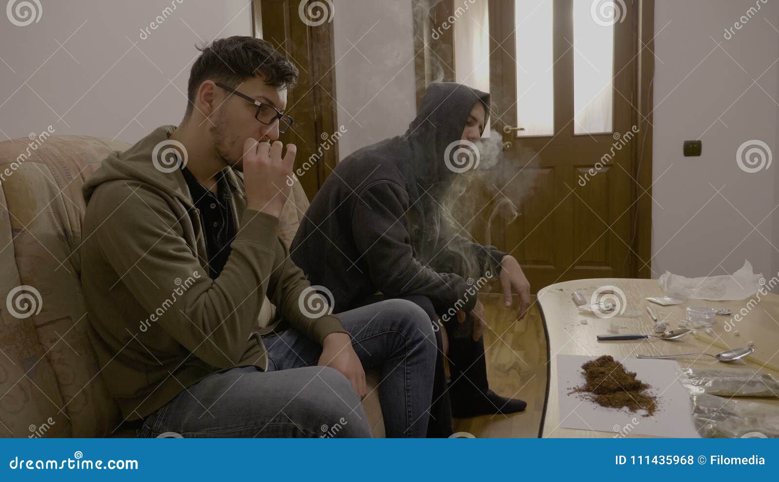 Narcotics Guys Sitting on the Couch with Table Full of Drugs Lightning ...