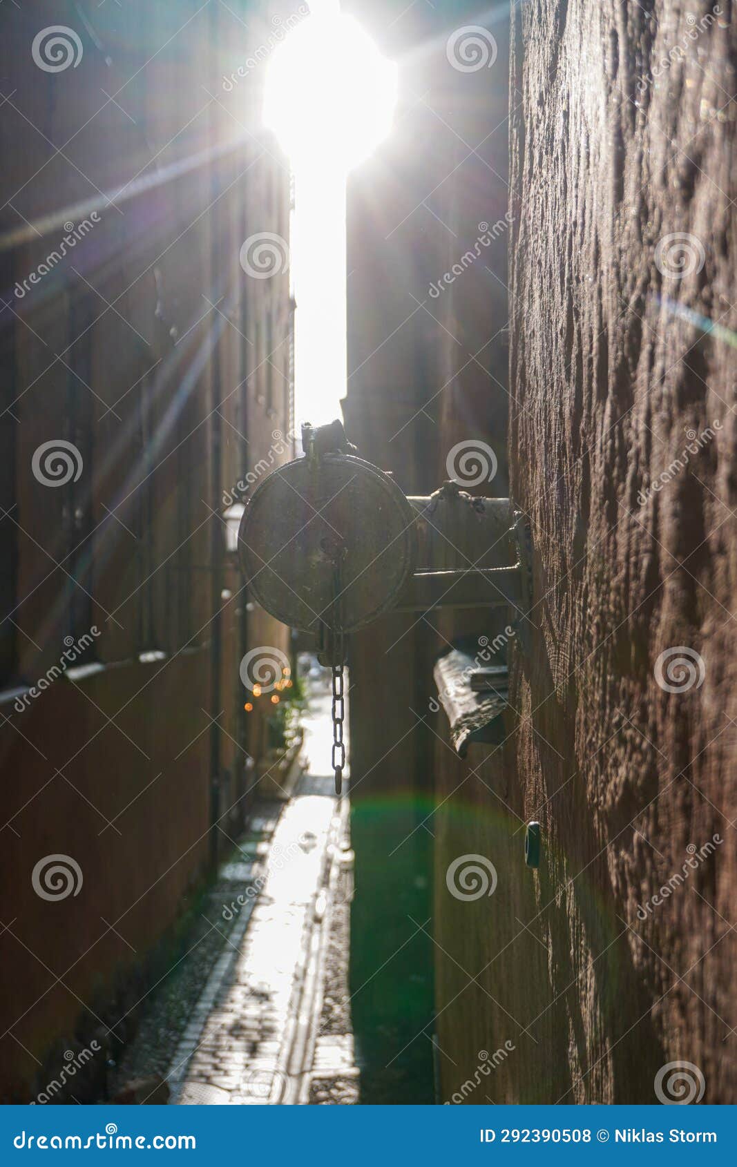 A Narrow Alley between Buildings Stock Photo - Image of reflection ...