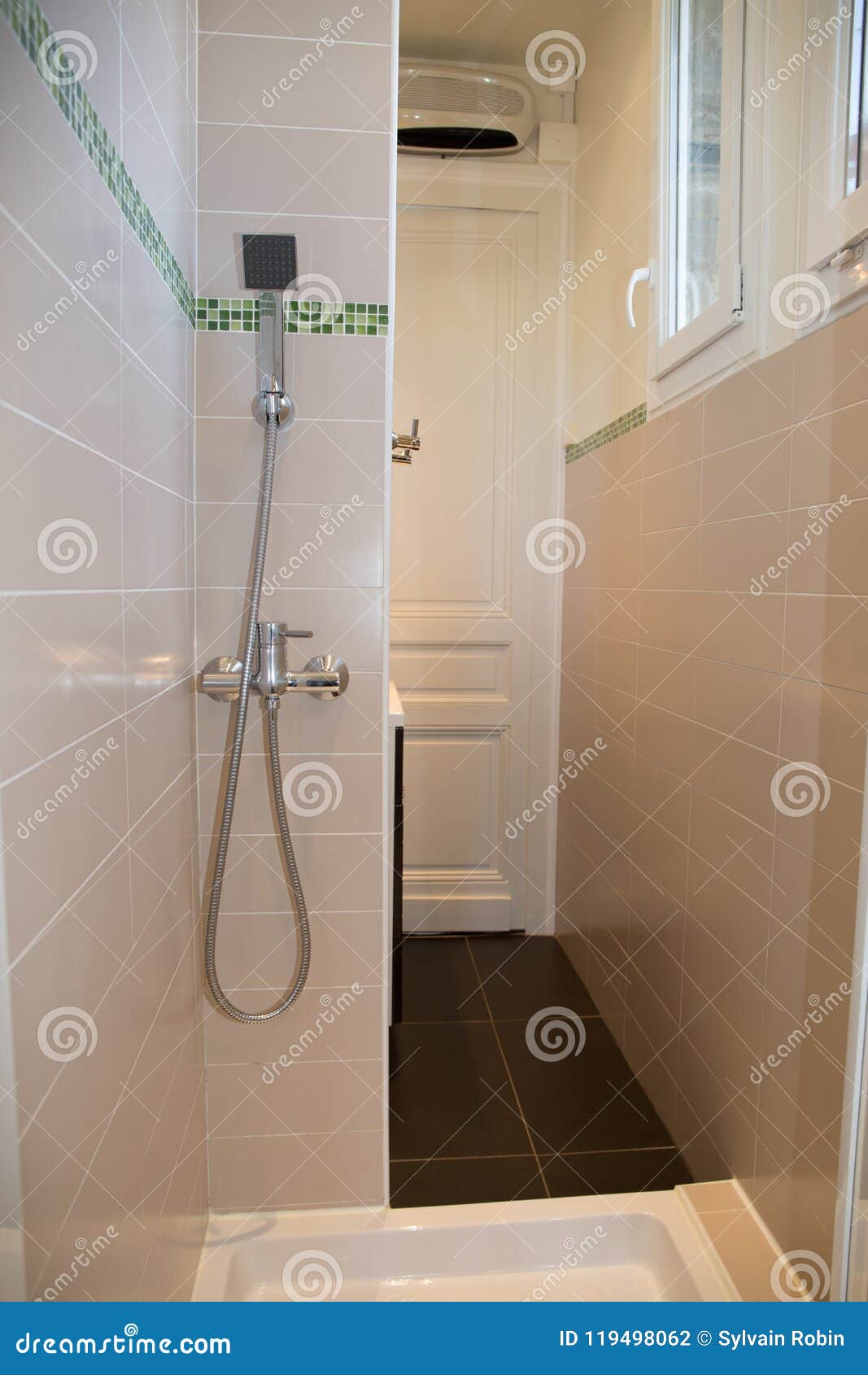 Narrow Bathroom with a Double Entry Stock Photo - Image of light ...