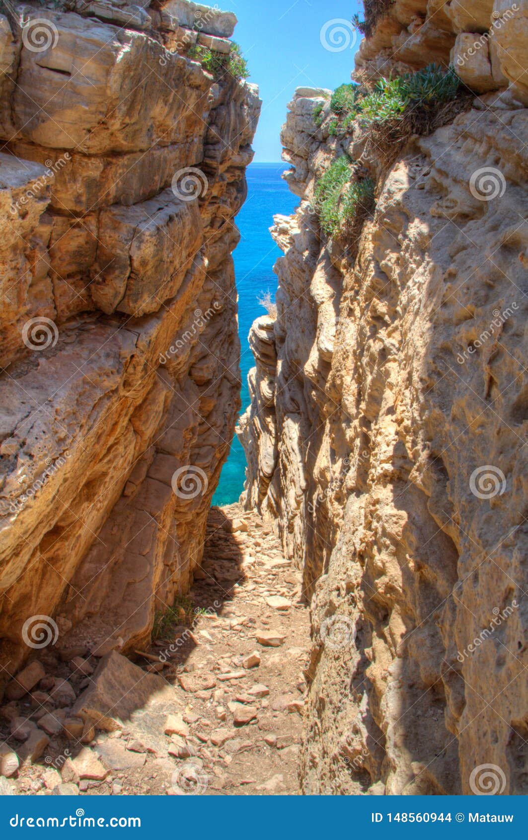 Narrow Cave Passage With A Cave Explorer Stock Photography ...