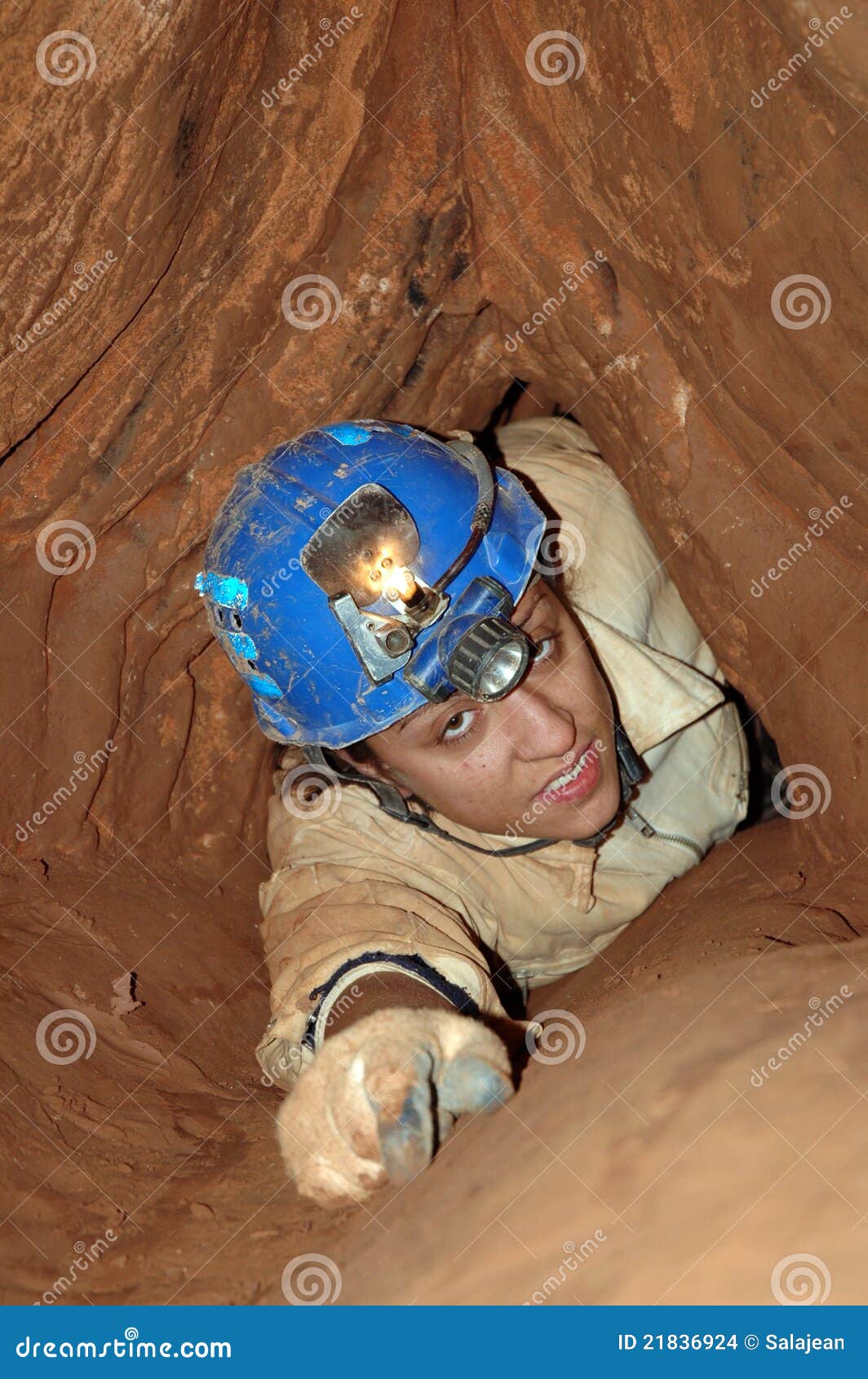 Narrow Cave Passage with Caver Stock Photo - Image of cavern, earth ...