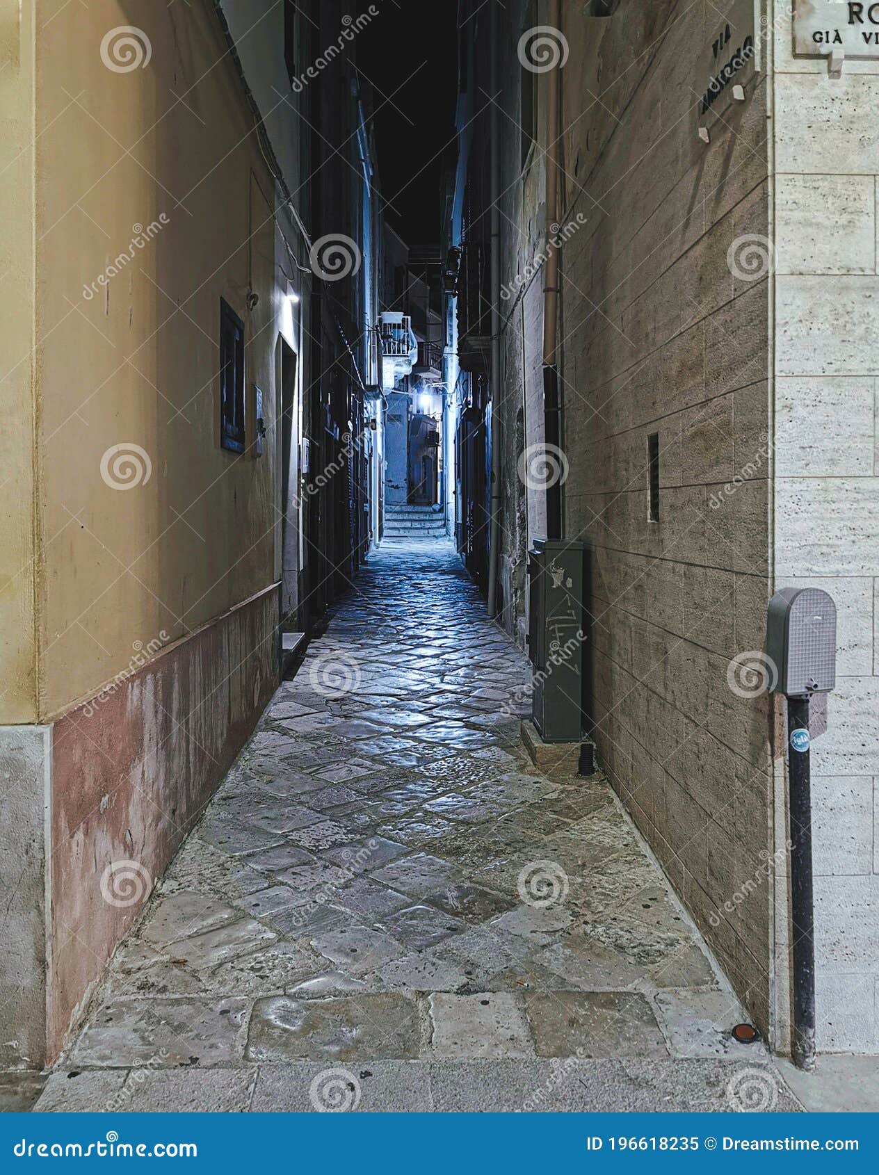 A narrow lane in Ostuni stock image. Image of strett - 196618235