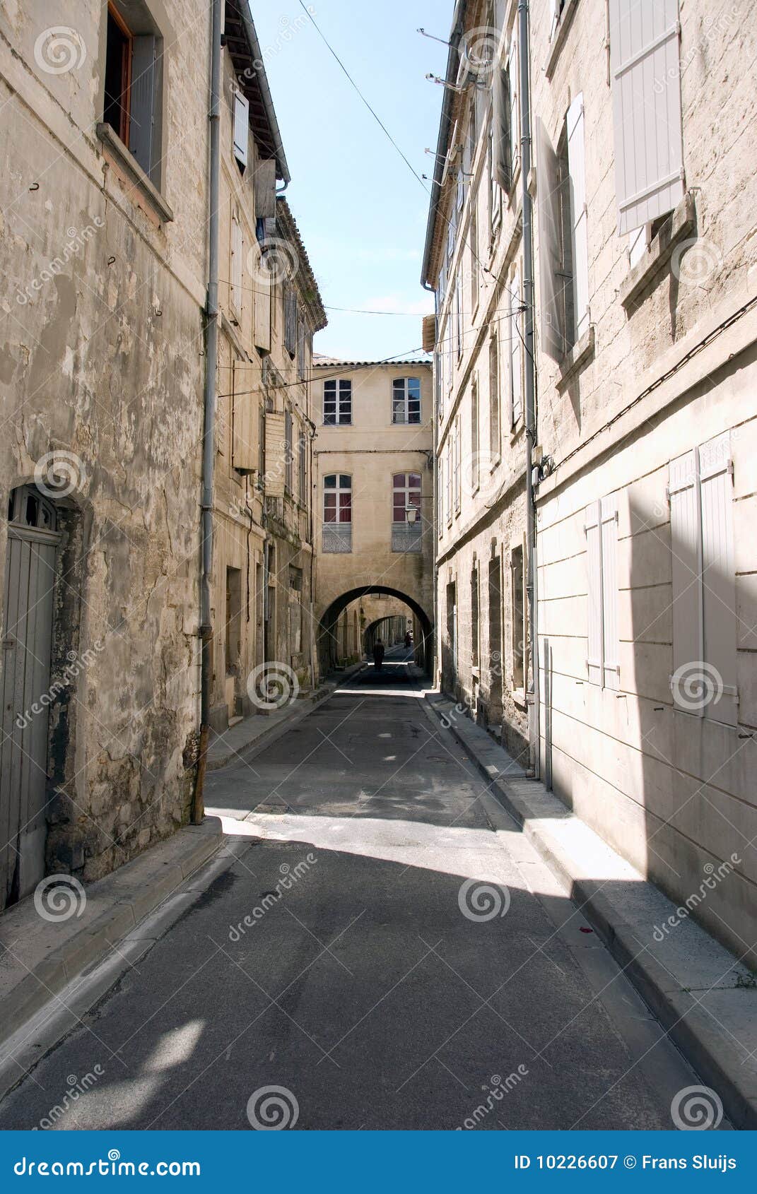 Narrow old European street stock image. Image of archway - 10226607