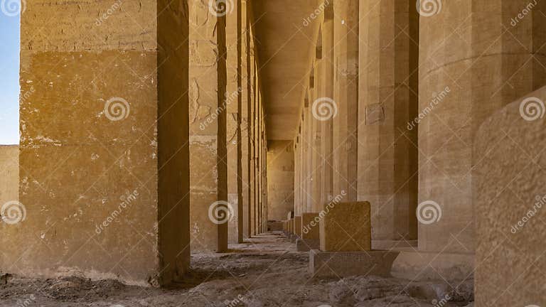 A Narrow Passage between Two Rows of Columns Leads Forward. Stock Image ...
