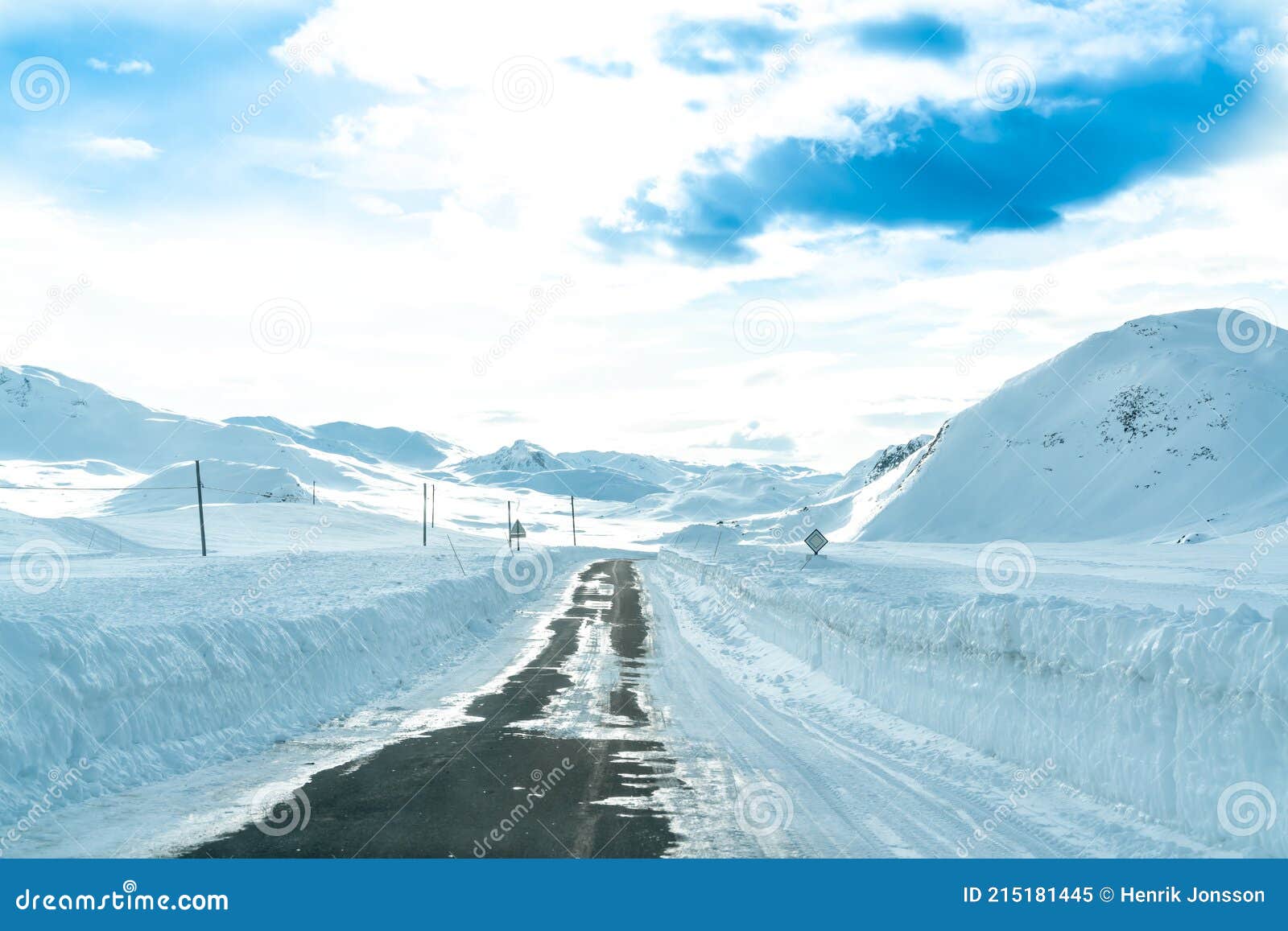 Narrow Road through a Snow Covered Mountain Pass in the Middle of ...