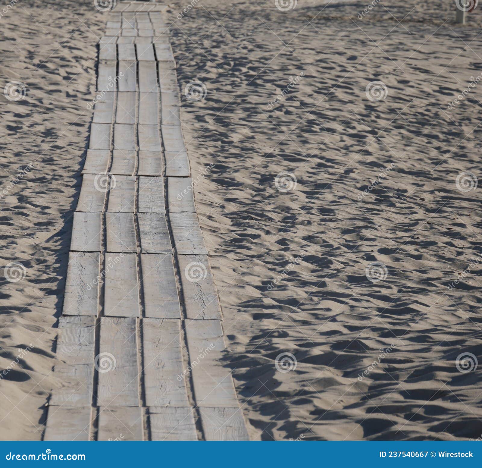 Narrow Stone Pathway on a Sandy Beach Stock Image - Image of landscape ...