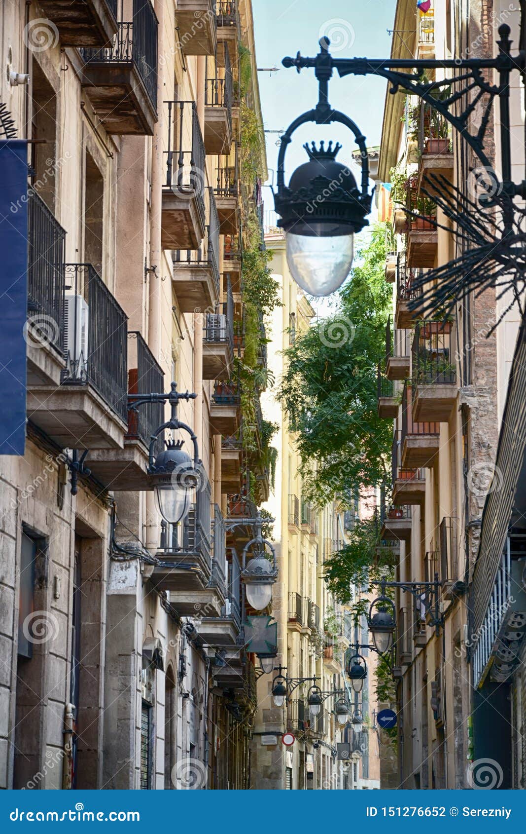 Narrow street in old city stock photo. Image of estate - 151276652