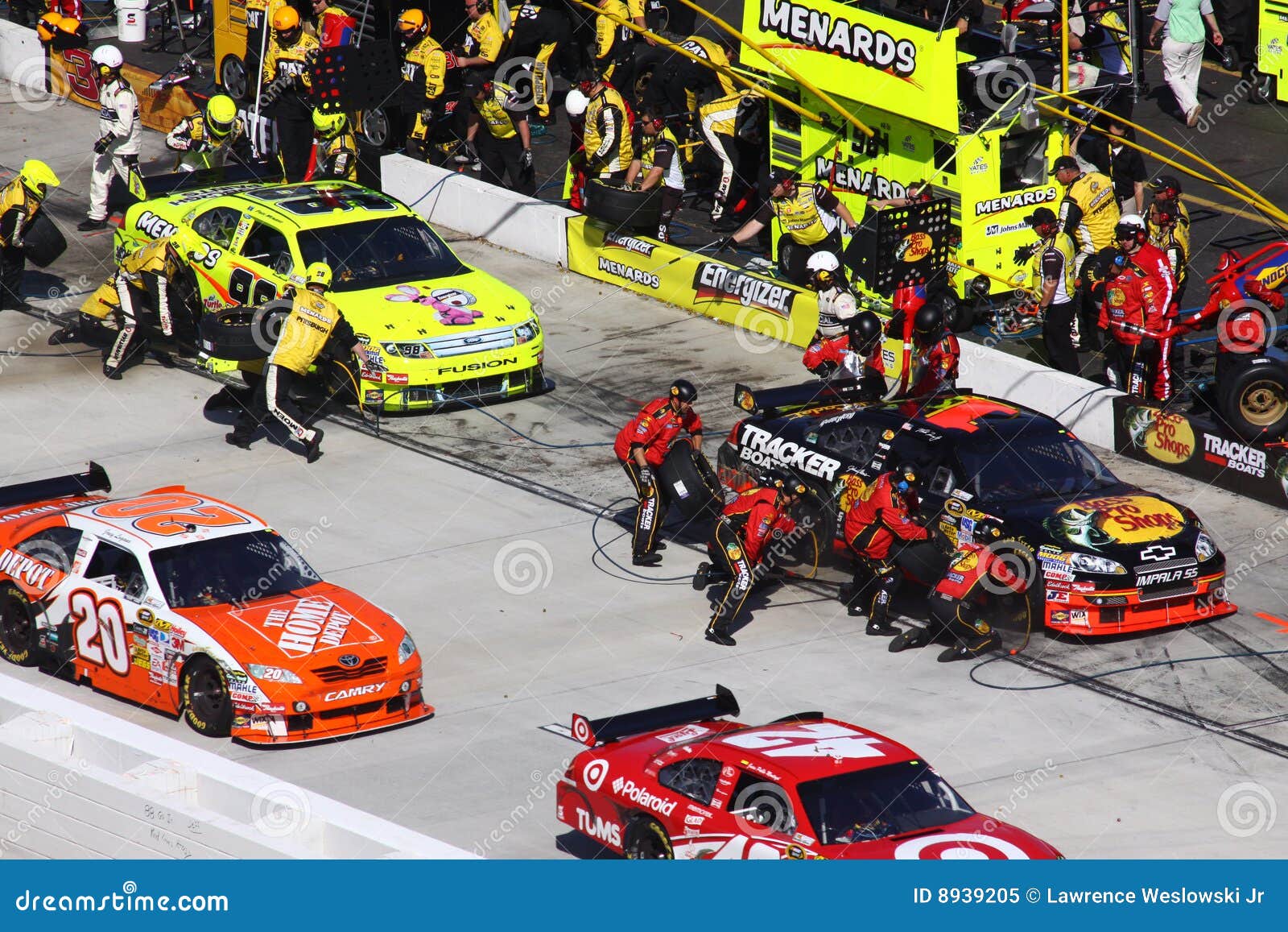 NASCAR - Pit Road is Busy! editorial image. Image of road - 8939205