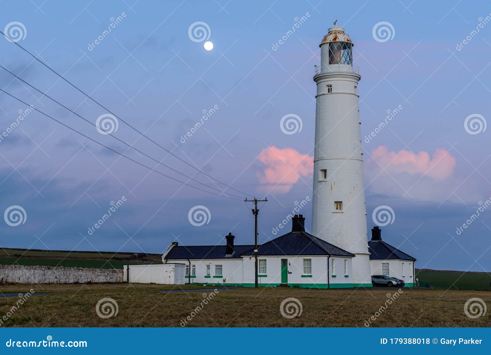 Nash Point Lighthouse at Sunset. the Lighthouse is in South Wales Stock ...