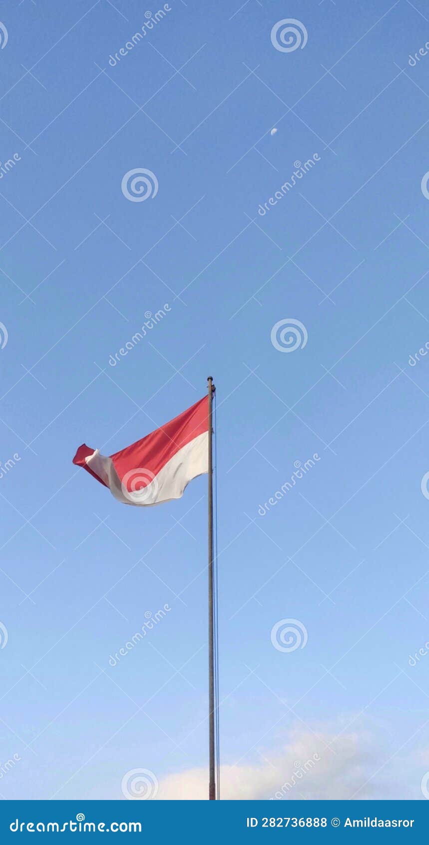 The National Flag of Indonesia Raya Flutters Mightily Stock Photo ...