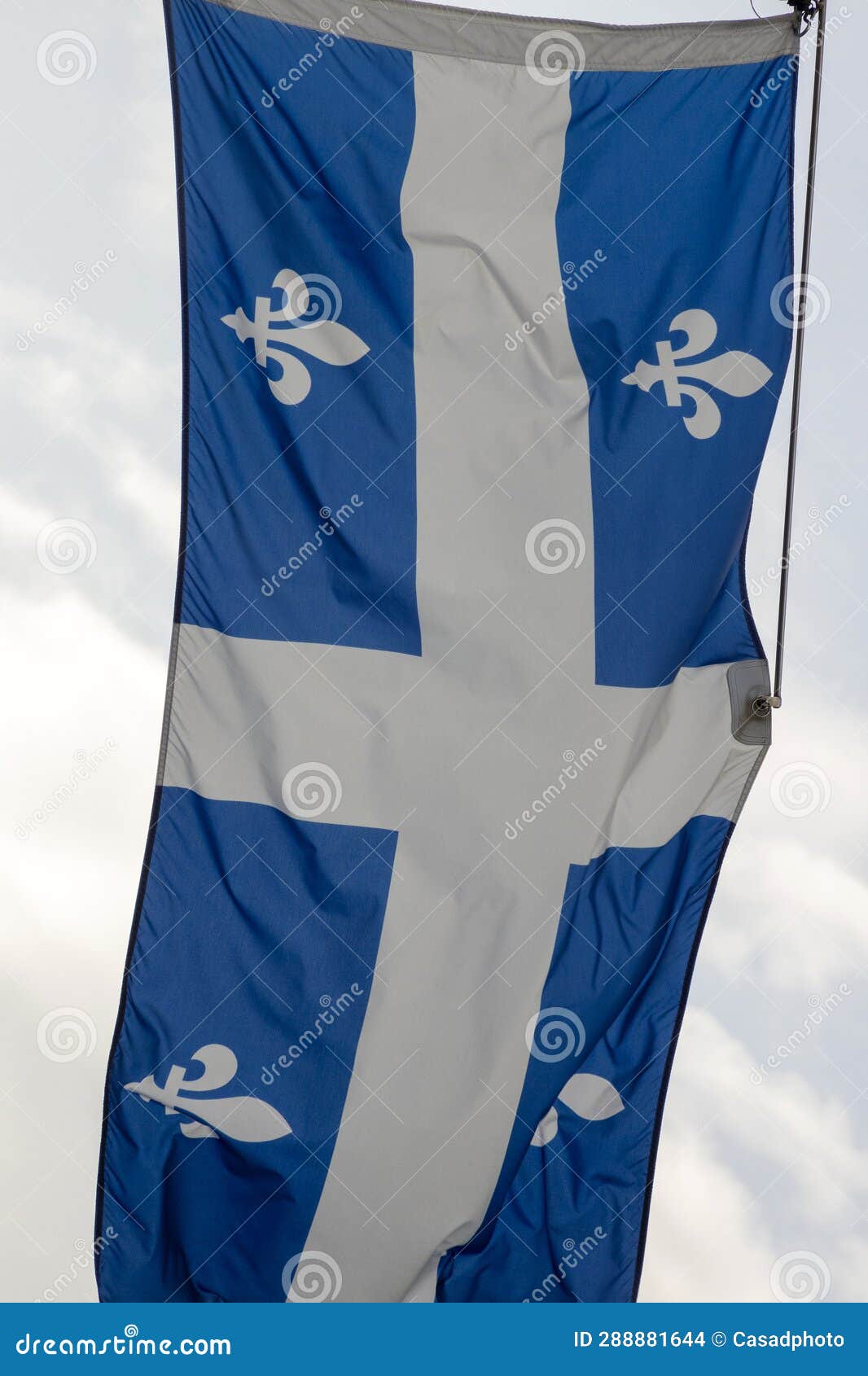 National Flag of Quebec on a Flagpole Flutering on Wind Stock Photo ...