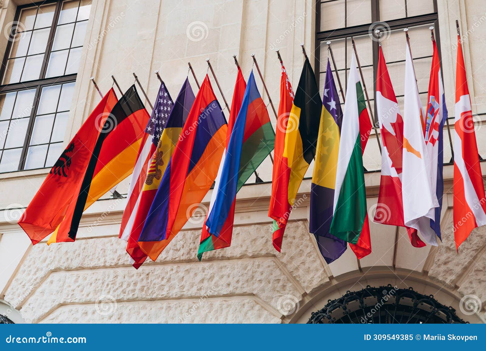 National Flags of Various Countries Flying in the Wind. Colorful Flags ...
