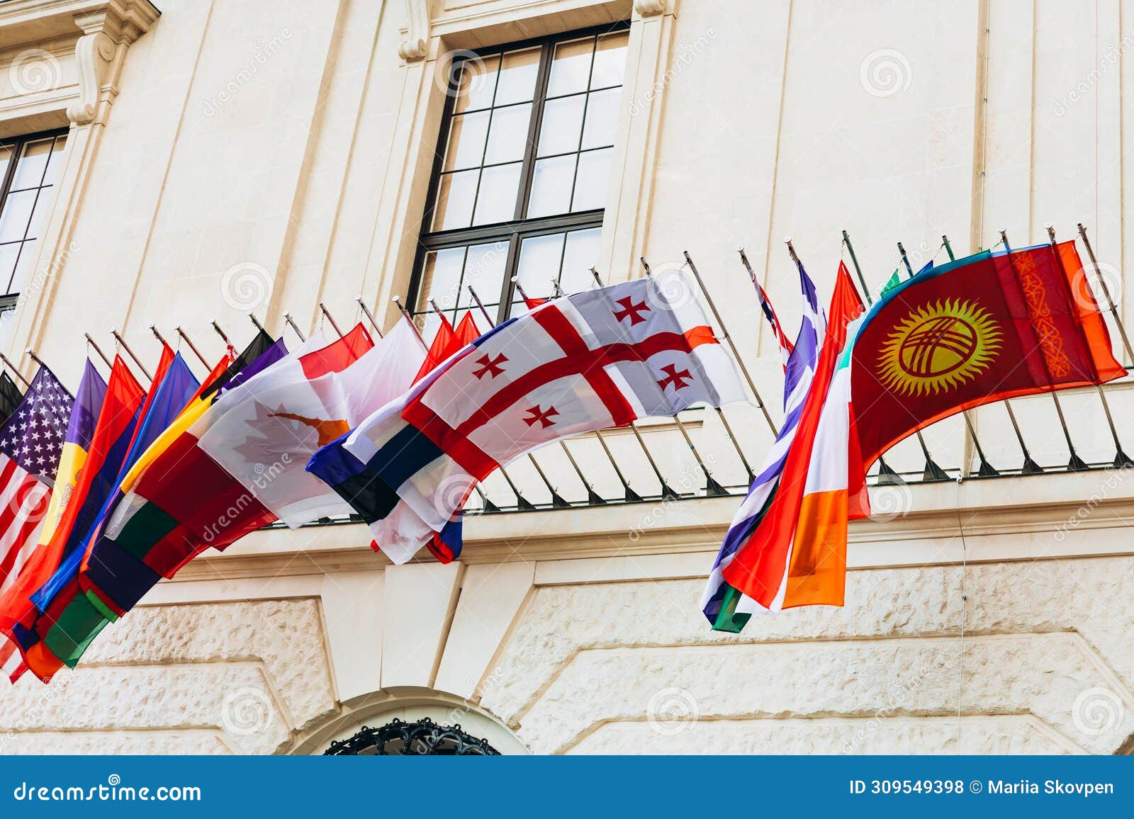 National Flags of Various Countries Flying in the Wind. Colorful Flags ...