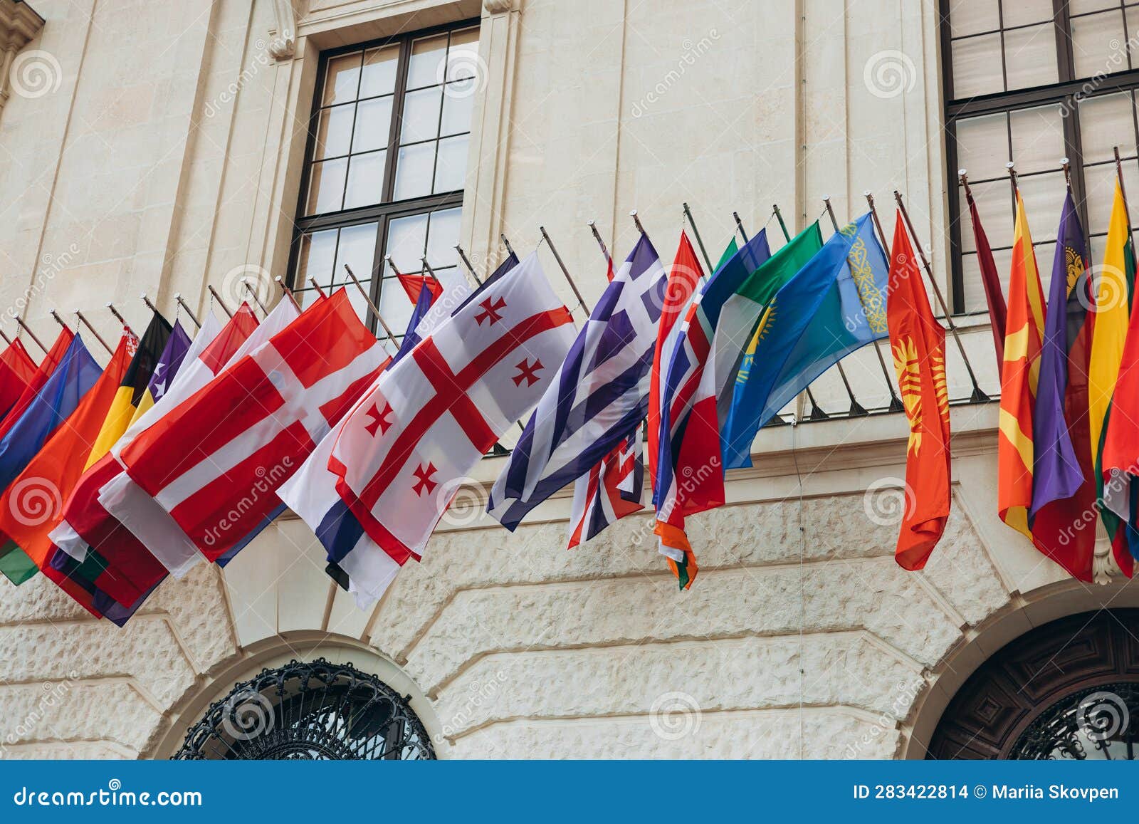 National Flags of Various Countries Flying in the Wind. Colorful Flags ...