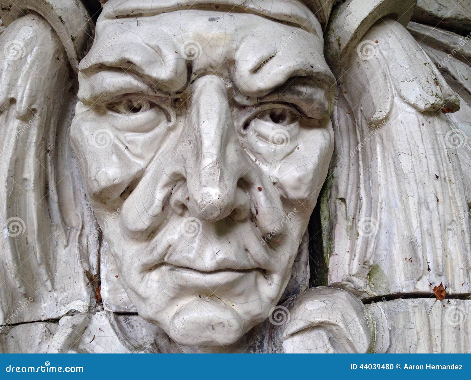 Native American Figure Carved into Stone Stock Photo - Image of tree ...