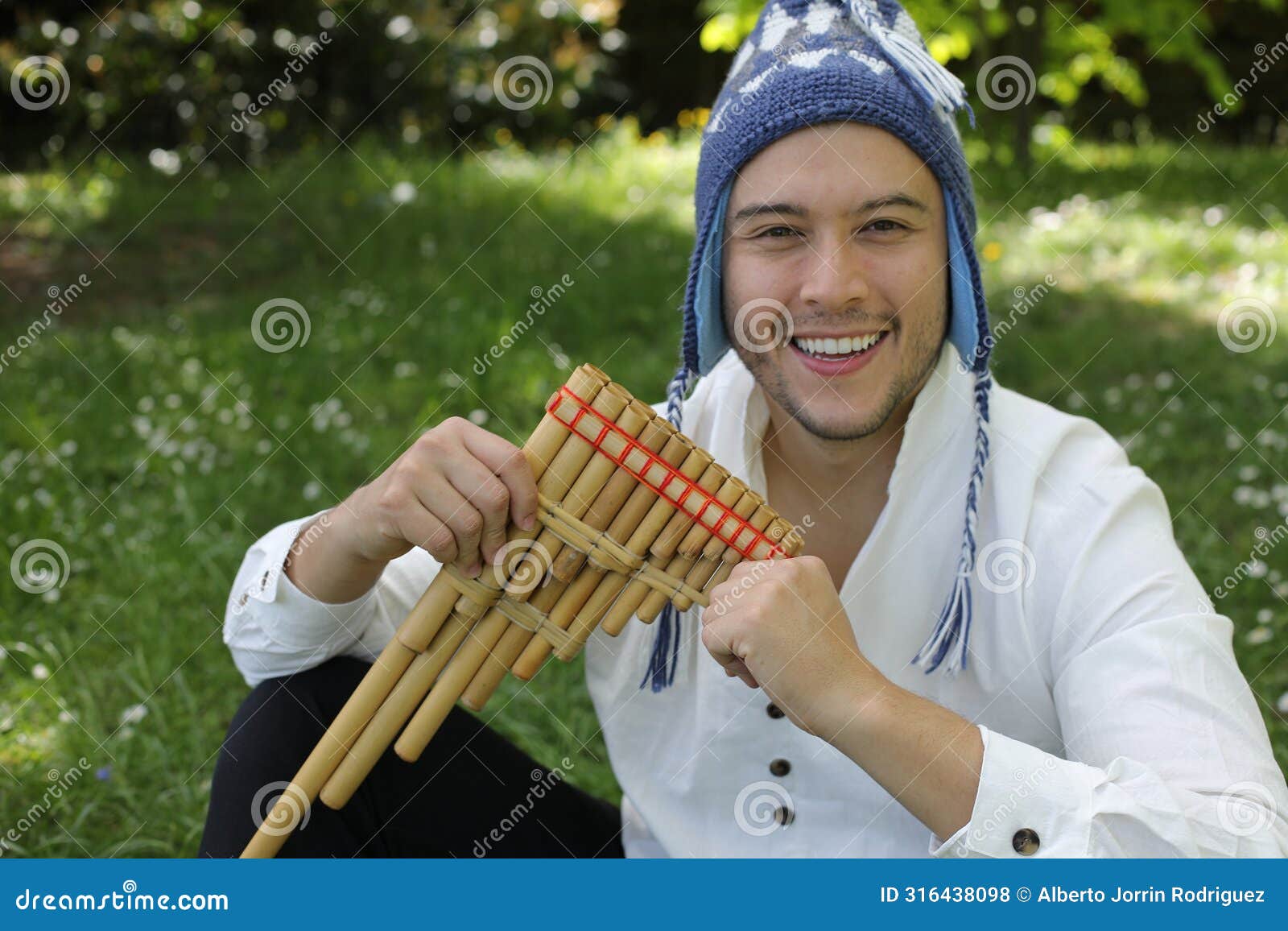 Native American Man Playing a Wooden Flute Stock Photo - Image of ...
