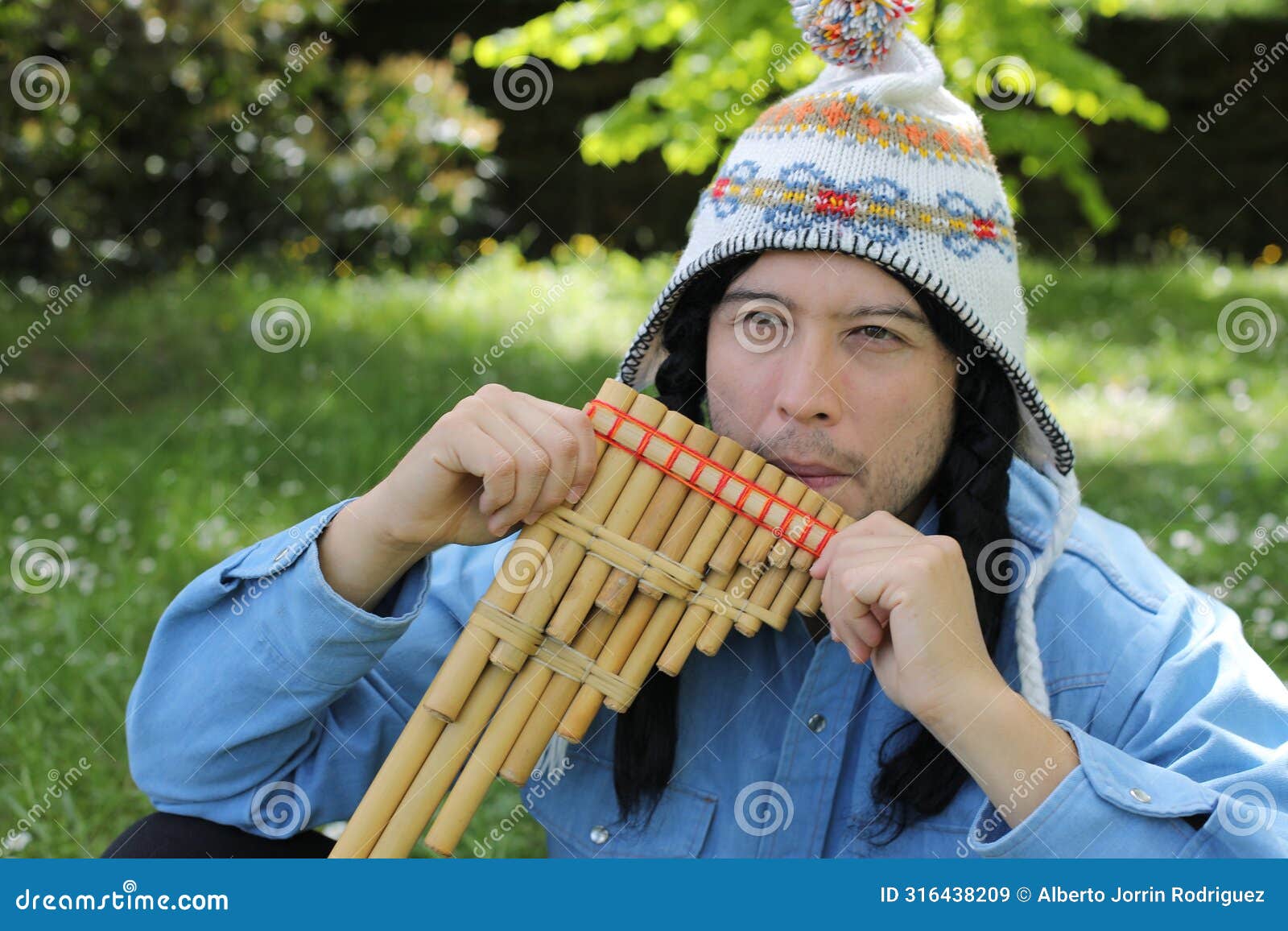 Native American Man Playing a Wooden Flute Stock Image - Image of ...