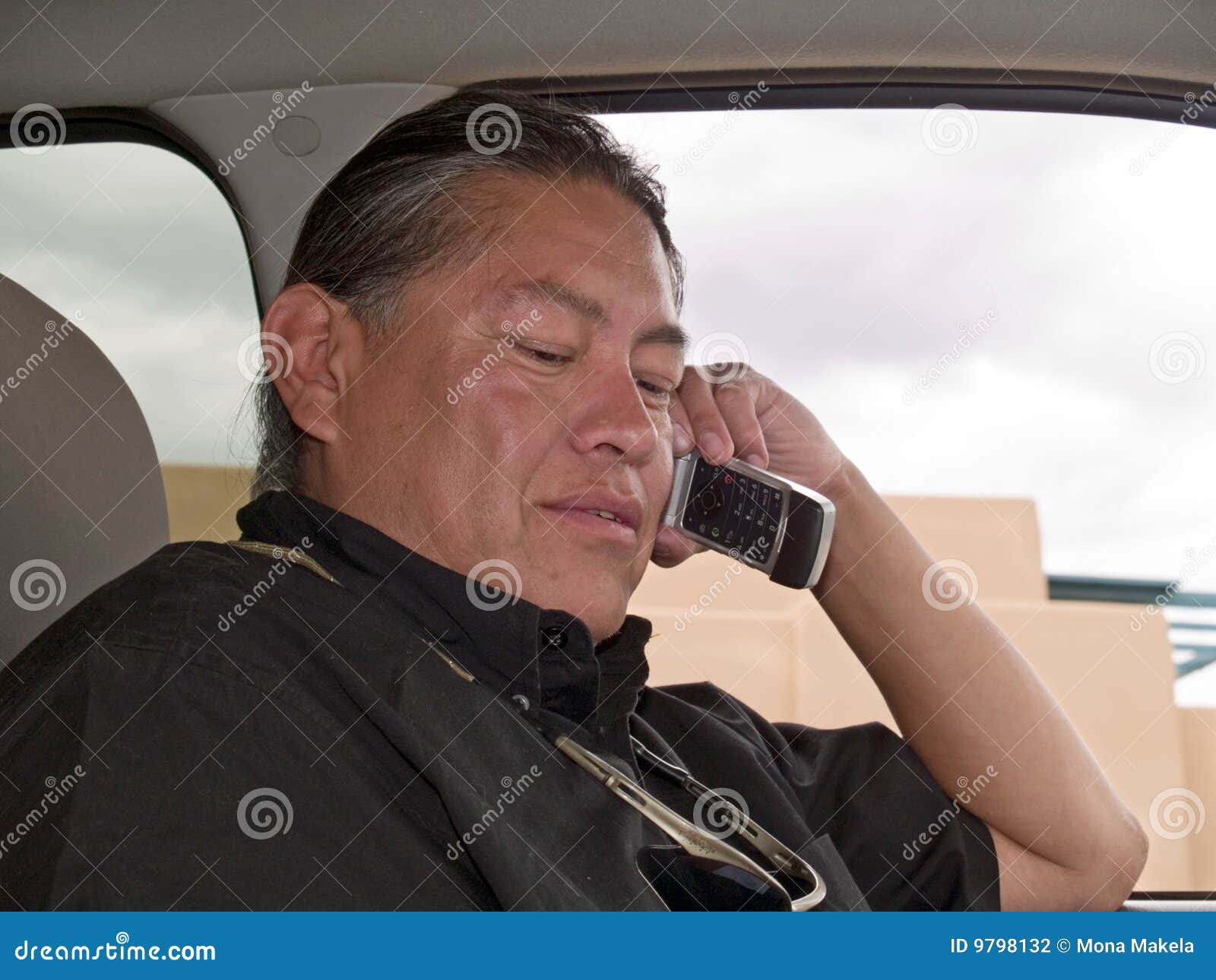 Native American Man Talking on Cell Phone Stock Photo - Image of ...