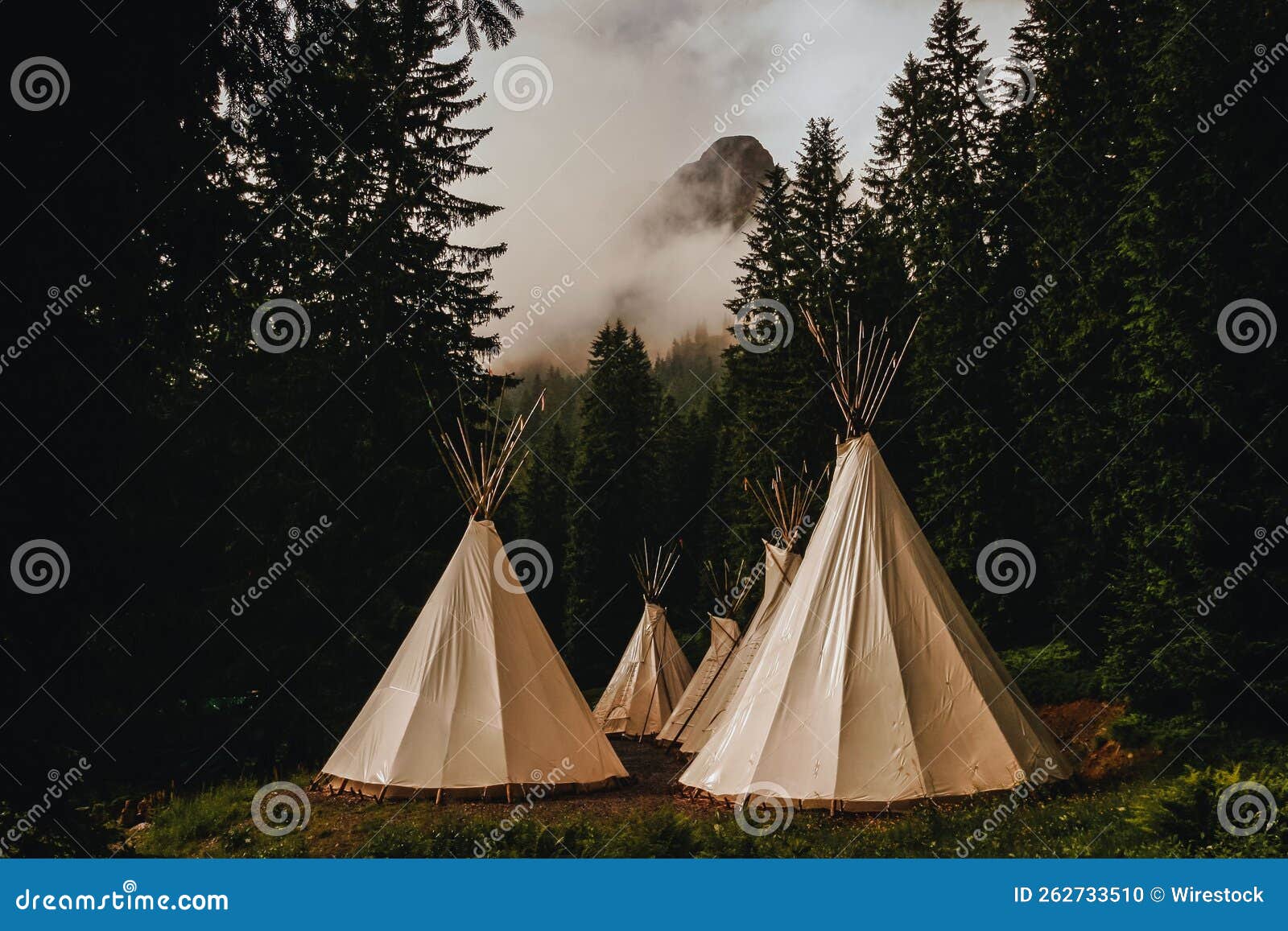 Native American Teepees after a Rain in the Middle of a Forest in the ...