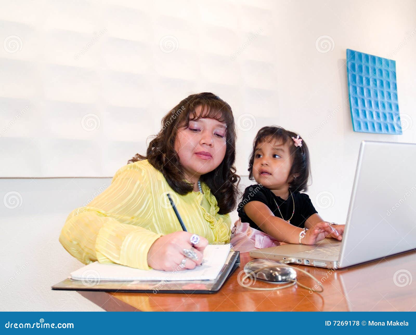 Native American Woman at Work with Child Stock Photo - Image of office ...