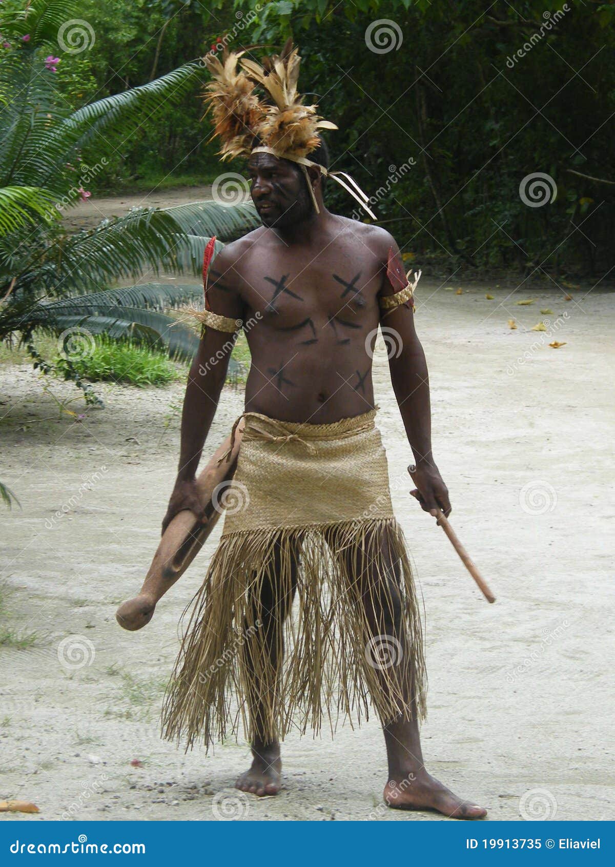 A Native Vanuatu Man Dressed In Traditional Straw Mat Attire Stock ...