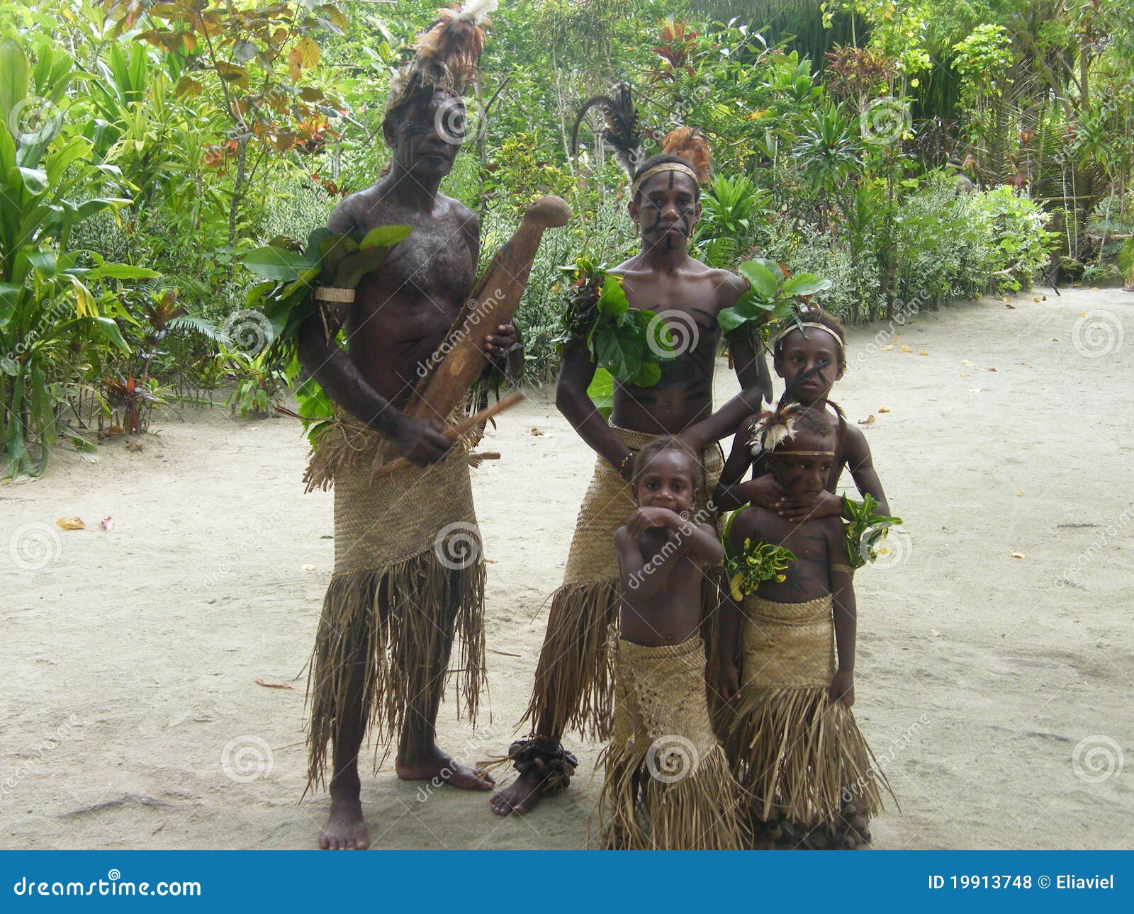 A Native Vanuatu Man Dressed In Traditional Straw Mat Attire Stock ...