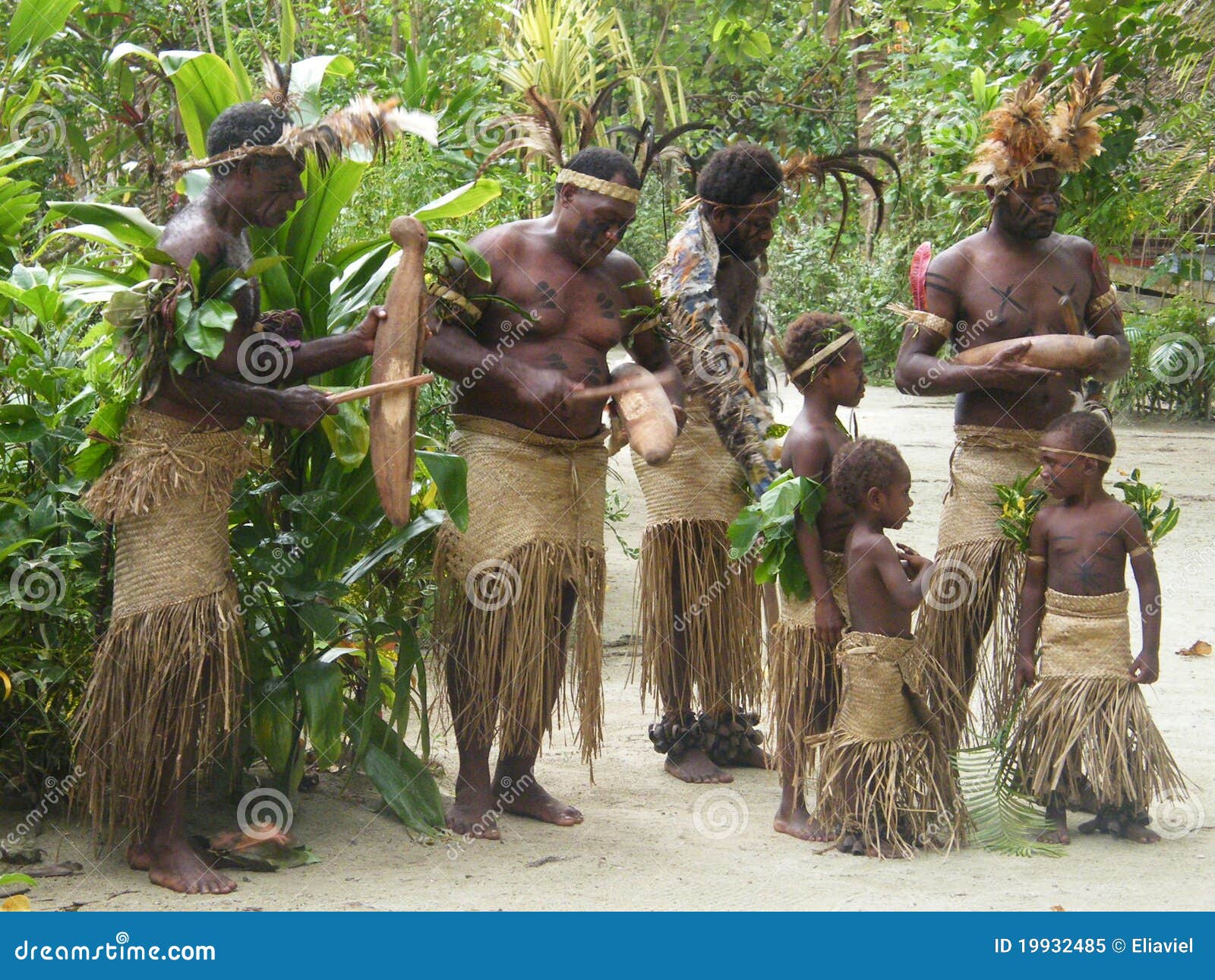 A Native Vanuatu Man Dressed In Traditional Straw Mat Attire Stock ...