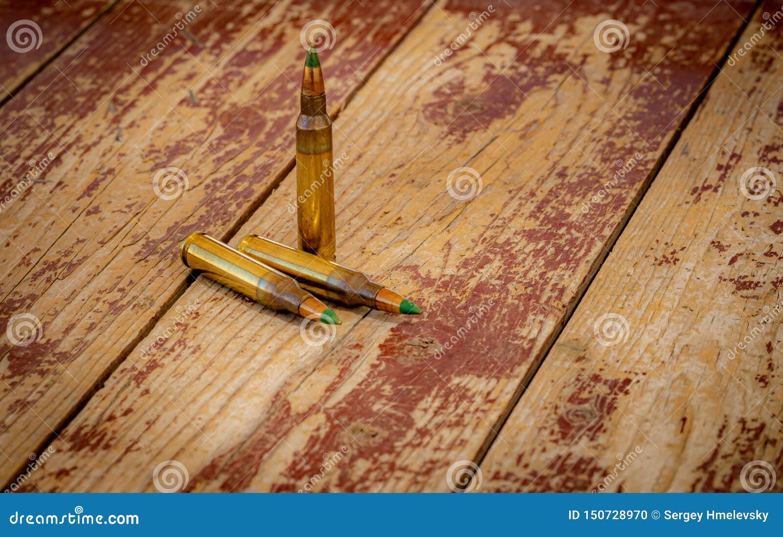 556 Nato Bullets on a Wooden Table Stock Photo - Image of firearm ...