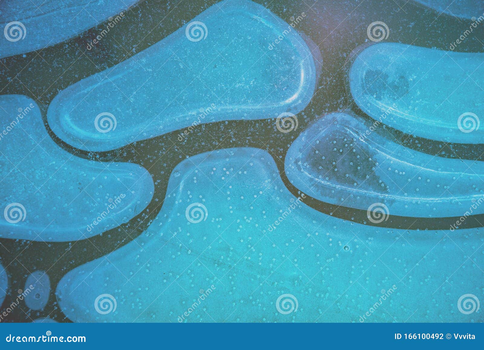 Natural Abstract Pattern on a Frozen Puddle Stock Photo - Image of ...