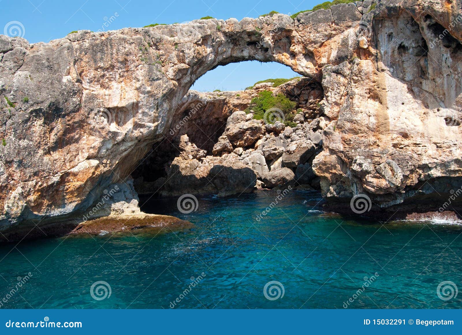 Natural Arch and the Grotto at Cala Antena Stock Image - Image of ...