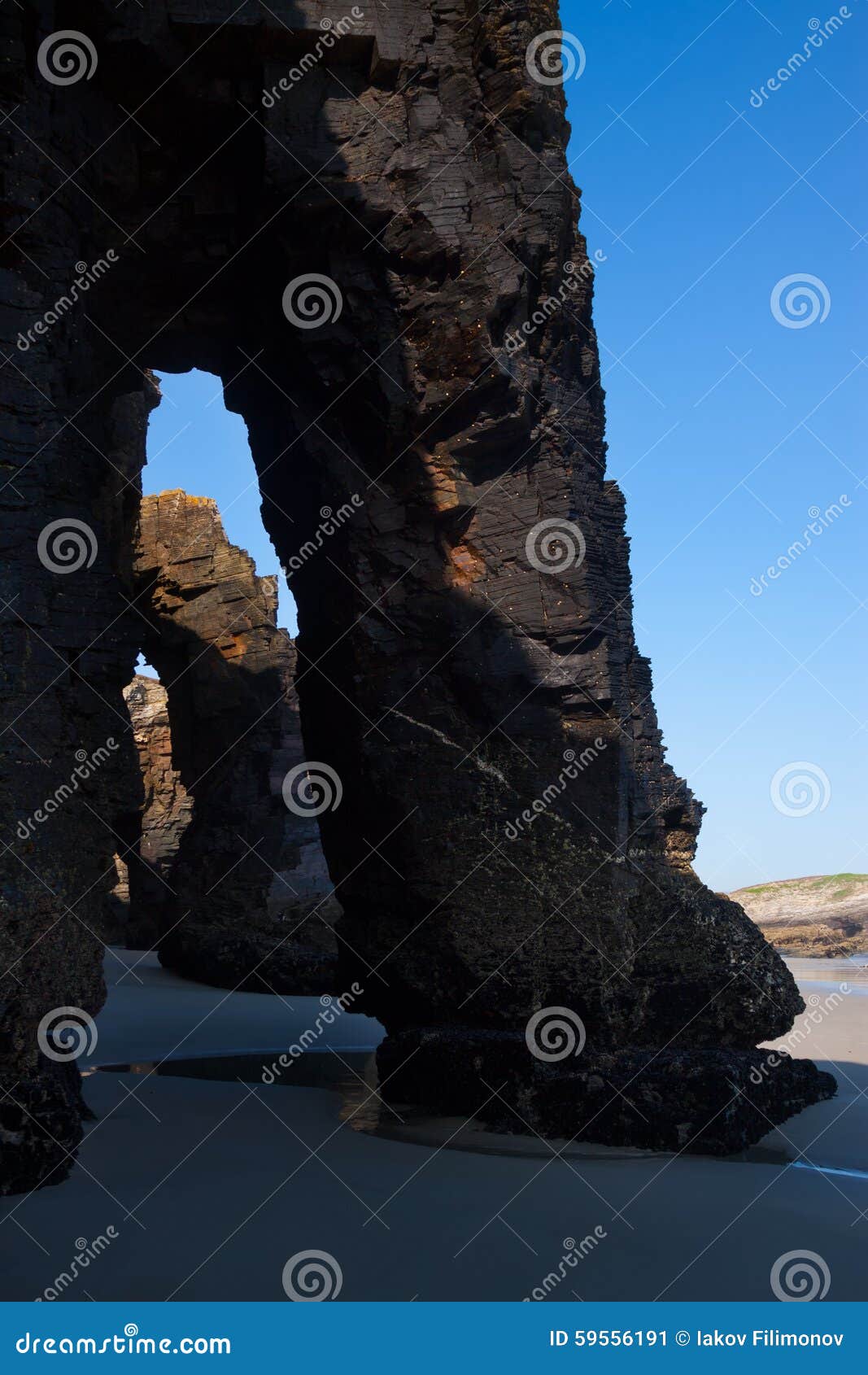 Natural arch in rocks stock image. Image of arch, rocks - 59556191