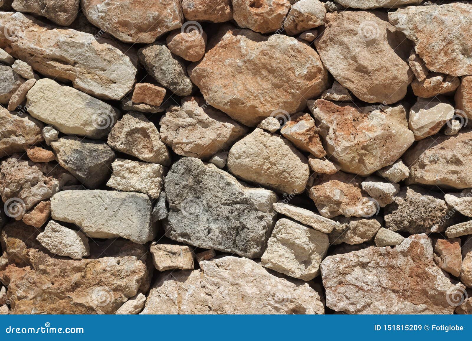Natural Beige Stone Wall Masonry Created by Stacking Stones on Top of ...
