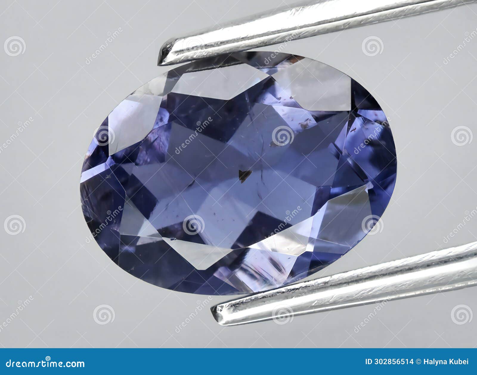 Natural Blue Iolite Kordierite Gem on the Background Stock Photo ...