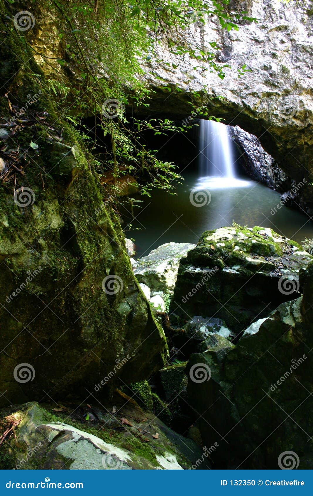 Natural Bridge Waterfall Cave Stock Photo - Image of queensland ...