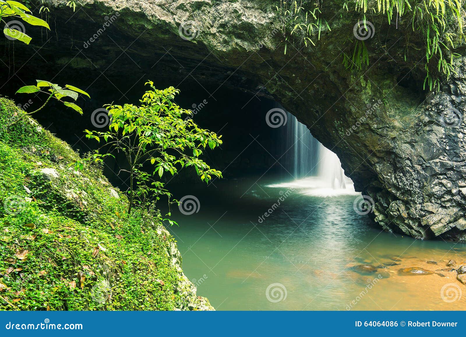 Natural Bridge Waterfall stock photo. Image of falls - 64064086