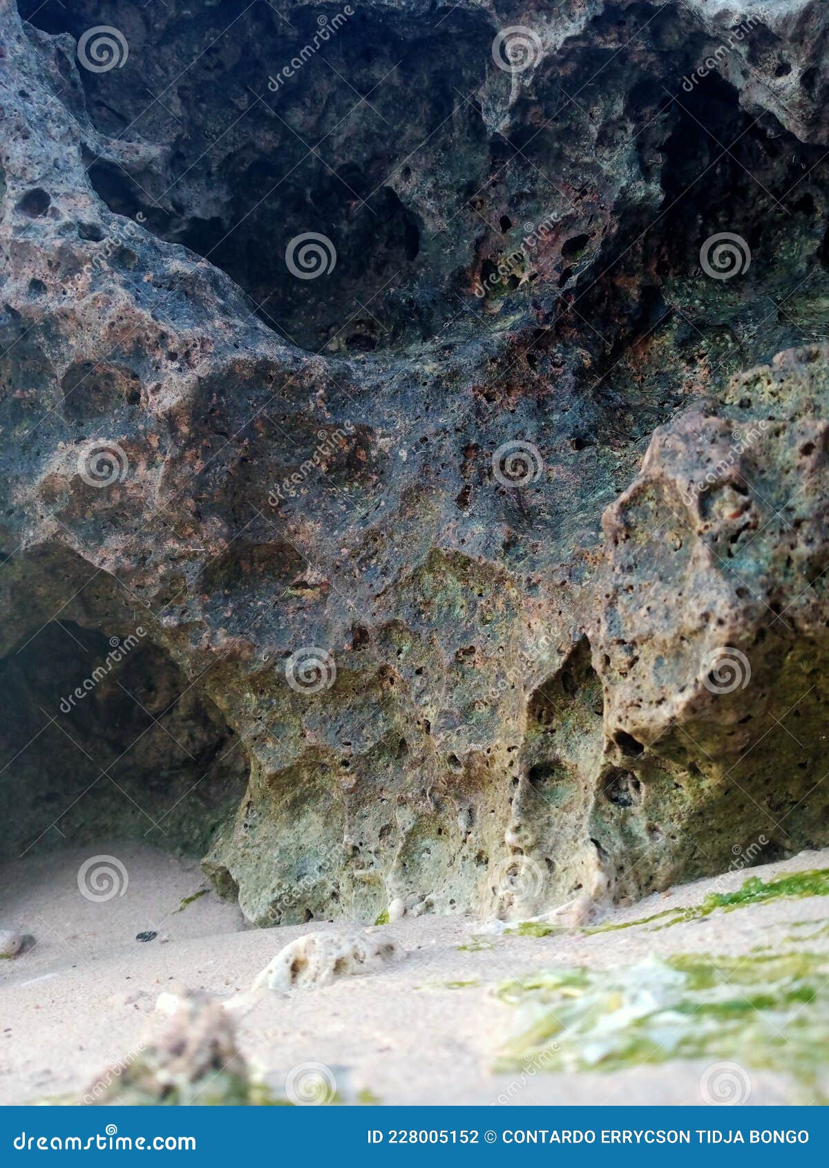 Natural cave on the rock stock photo. Image of cave - 228005152
